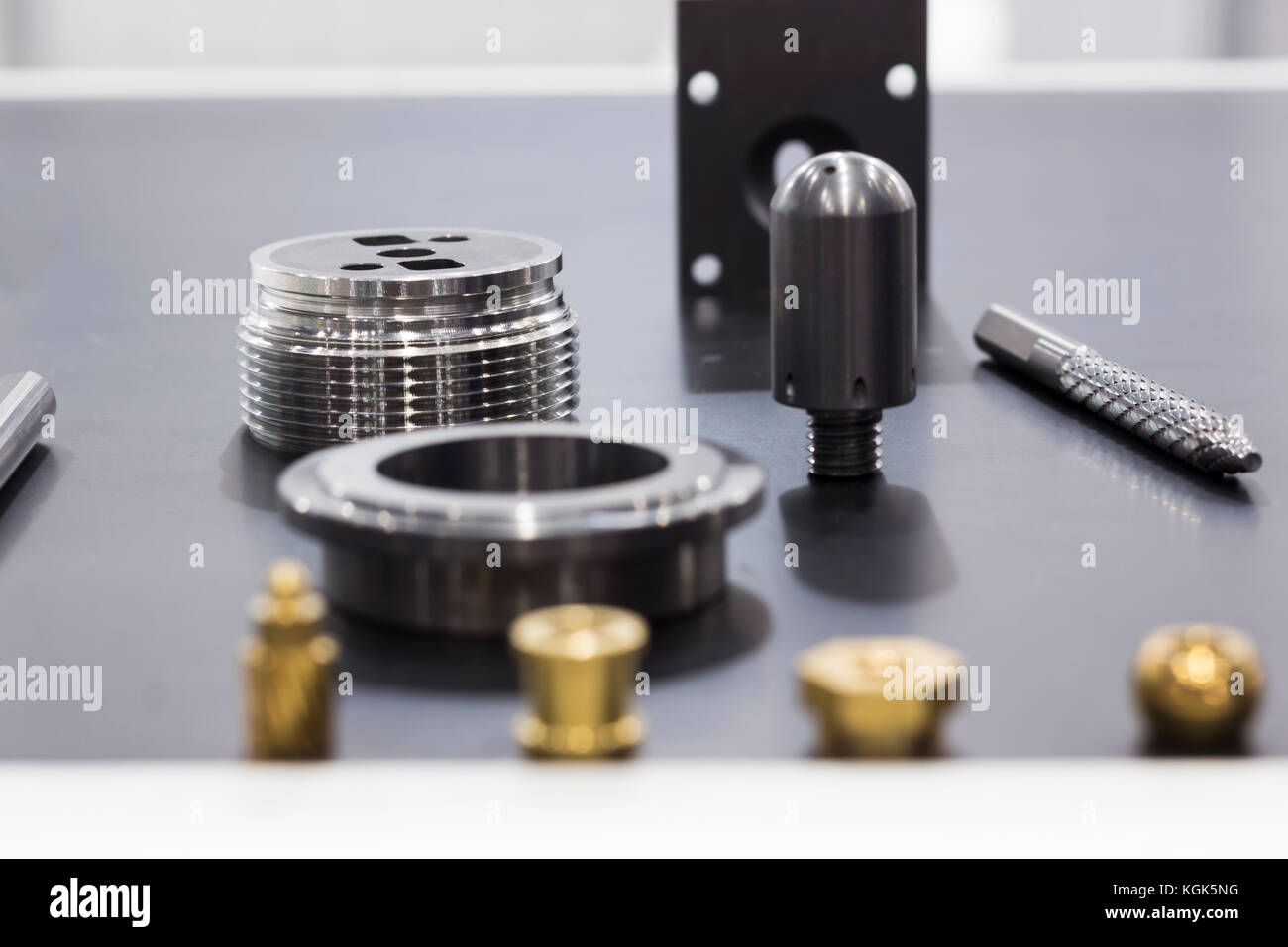 small metal mechanical spare parts for industry Stock Photo - Alamy