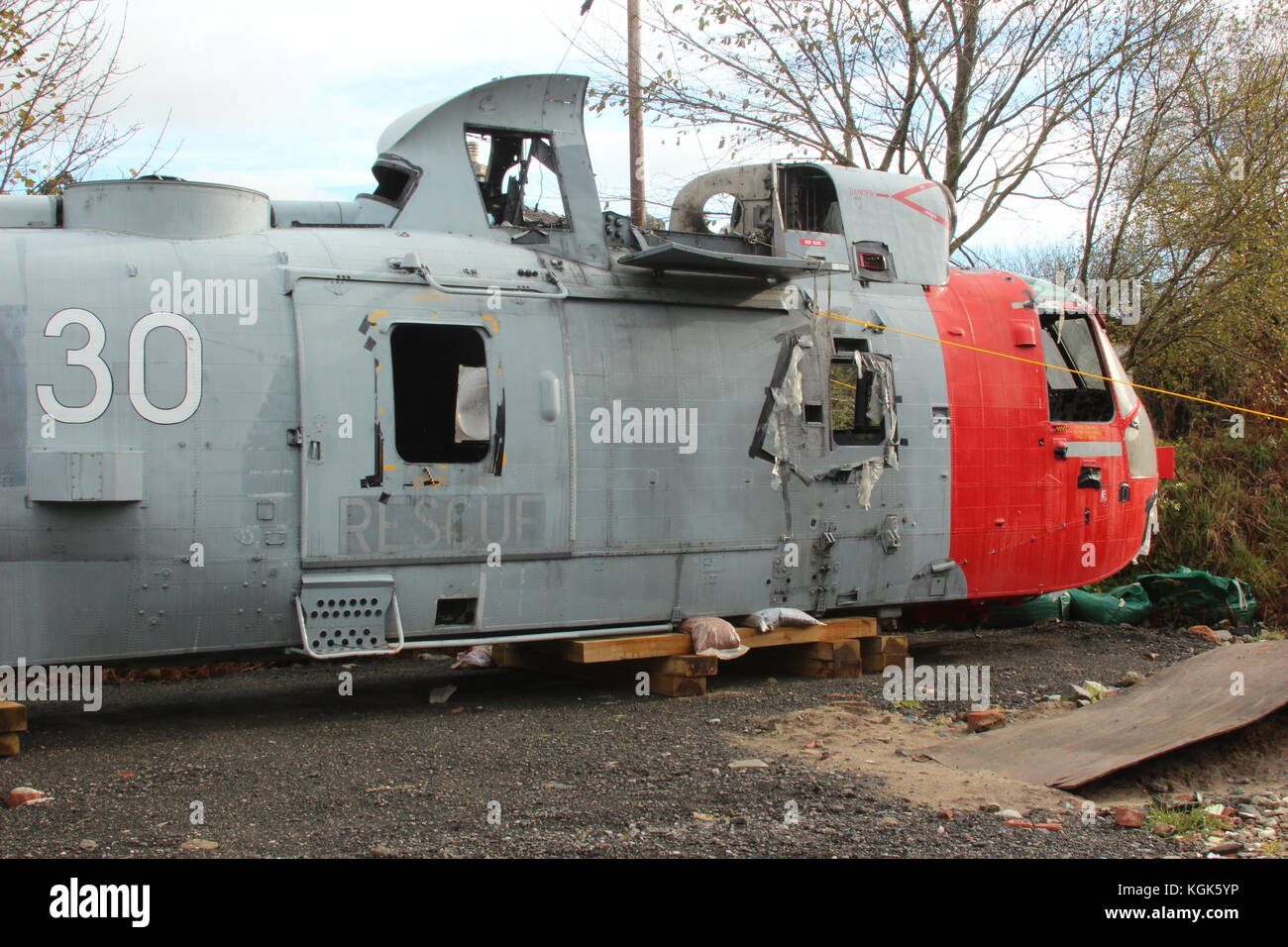 A old scrap Helicopter parked up in someone's backyard in Llanberis ...
