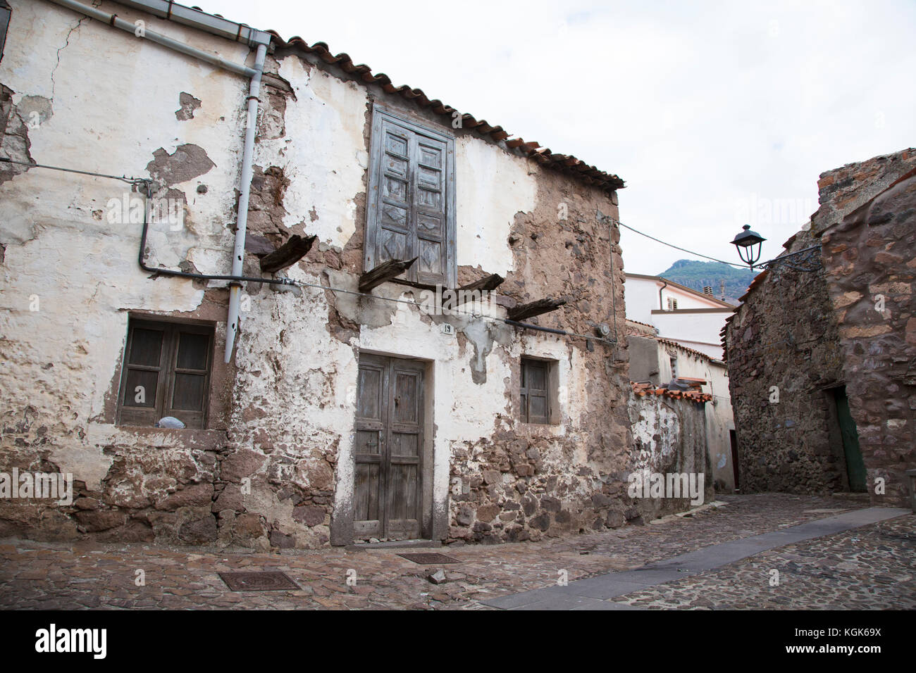 A derelict building in the old village of Bortigali, Sardinia, Italy ...