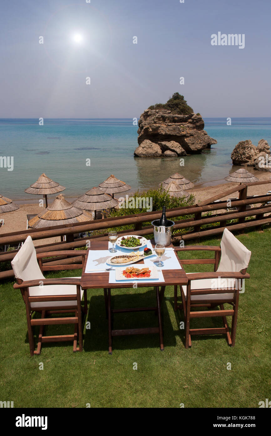 healthy seafood on a table for two by the sea Stock Photo - Alamy