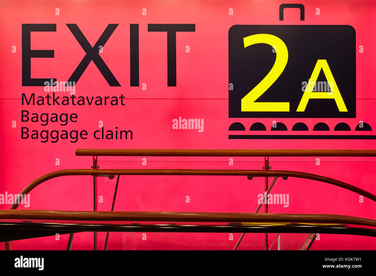 Exit information signal post at airport terminal. Travel background ...