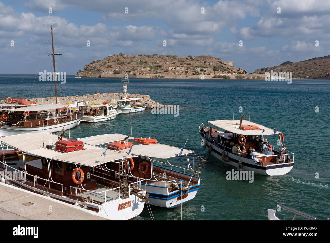 Plaka Harbour, Crete,Greece, October 2017. Ferry boats on Plaka quay ...