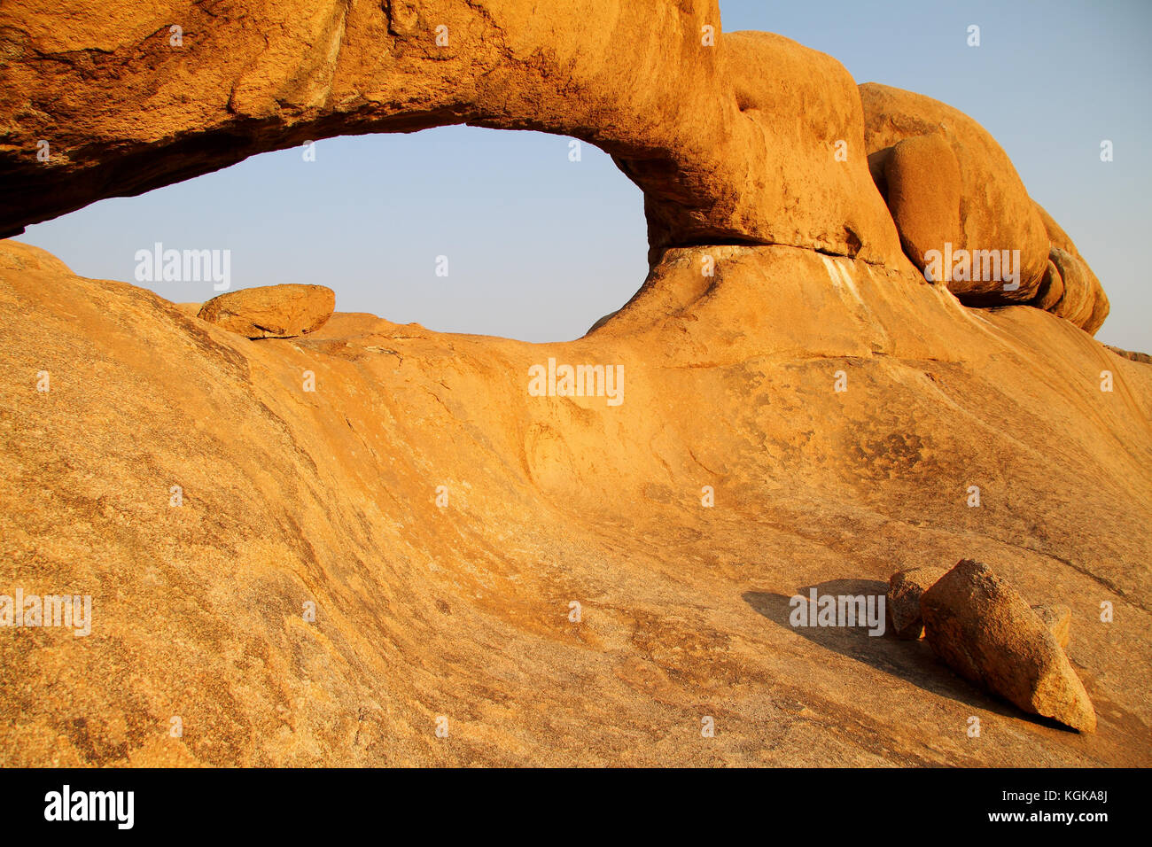 Big granite rock arch at sunrise around Spitzkoppe in Namibia Stock ...