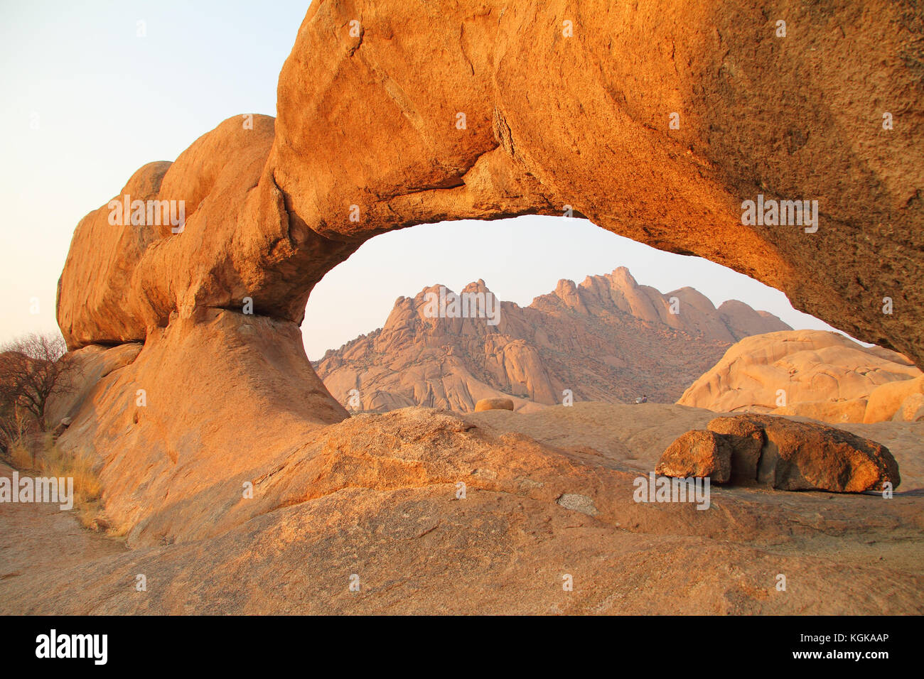 Big granite rock arch at sunset around Spitzkoppe in Namibia Stock ...