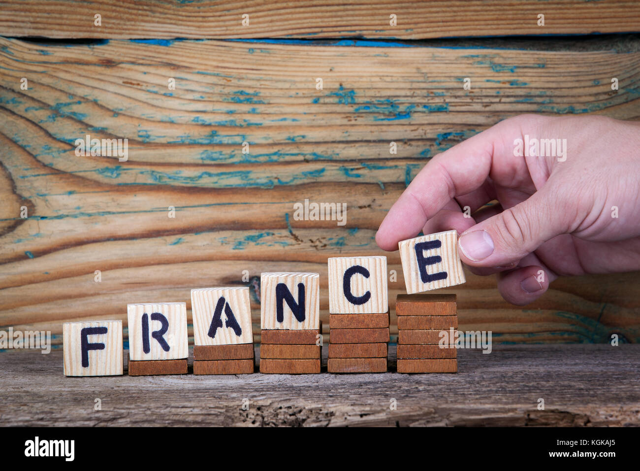 France. Wooden letters on the office desk, informative and ...