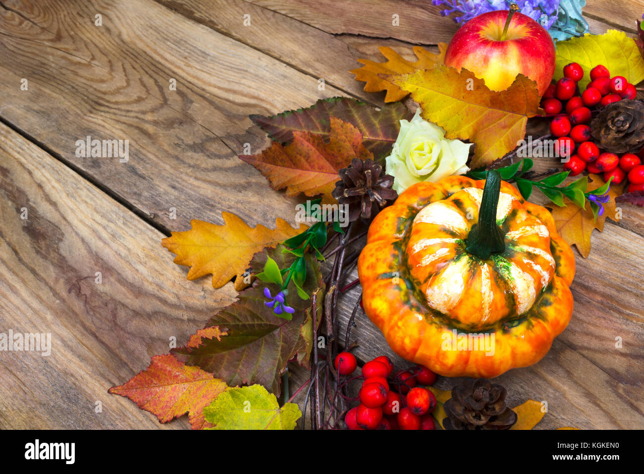 Thanksgiving background with fall yellow, red, green leaves, pumpkin ...