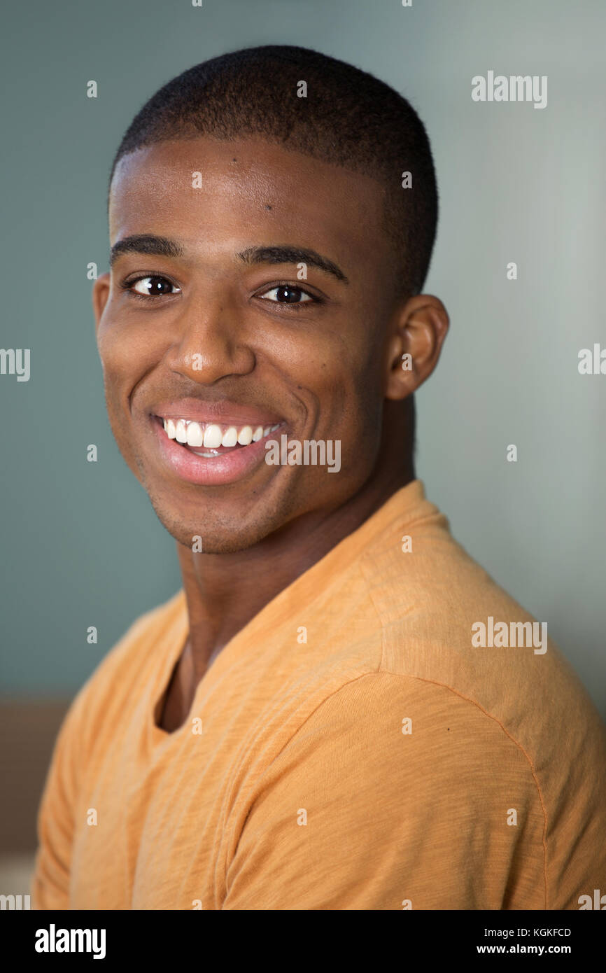 Happy young man smiling Stock Photo - Alamy Happy young man smiling Stock Photo - Alamy