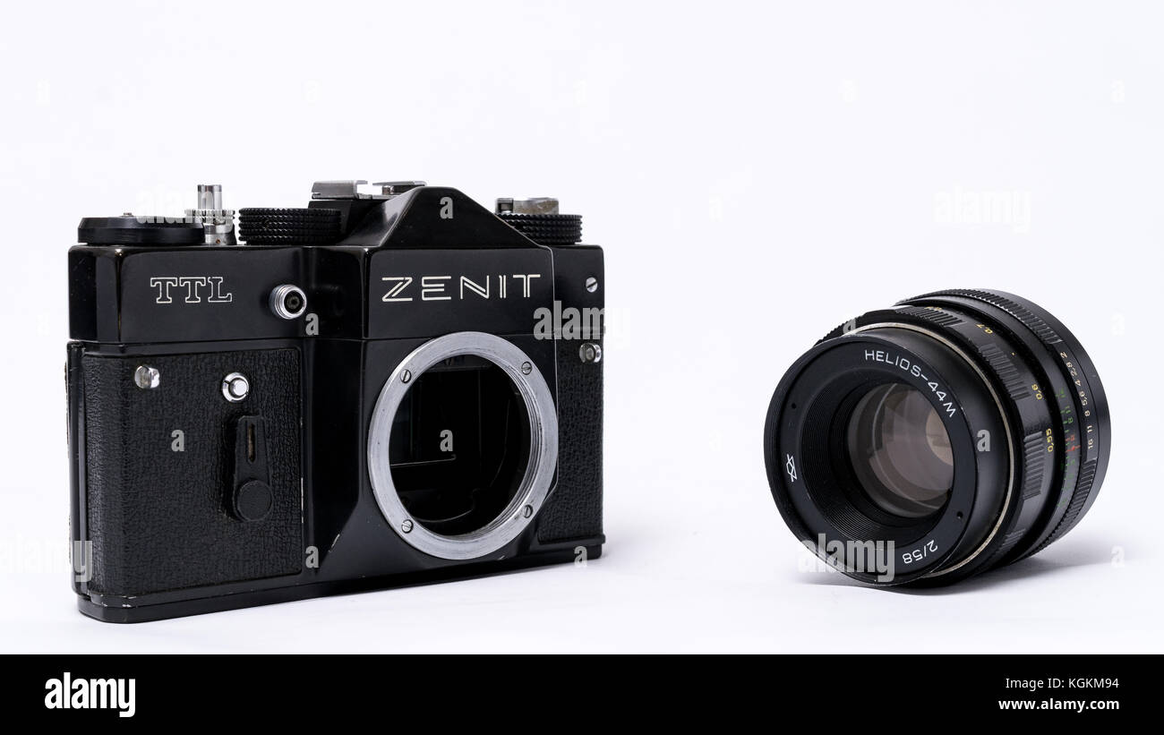 Old Soviet Zenit TLL 35 mm film camera isolated on white with Helios 44 ...