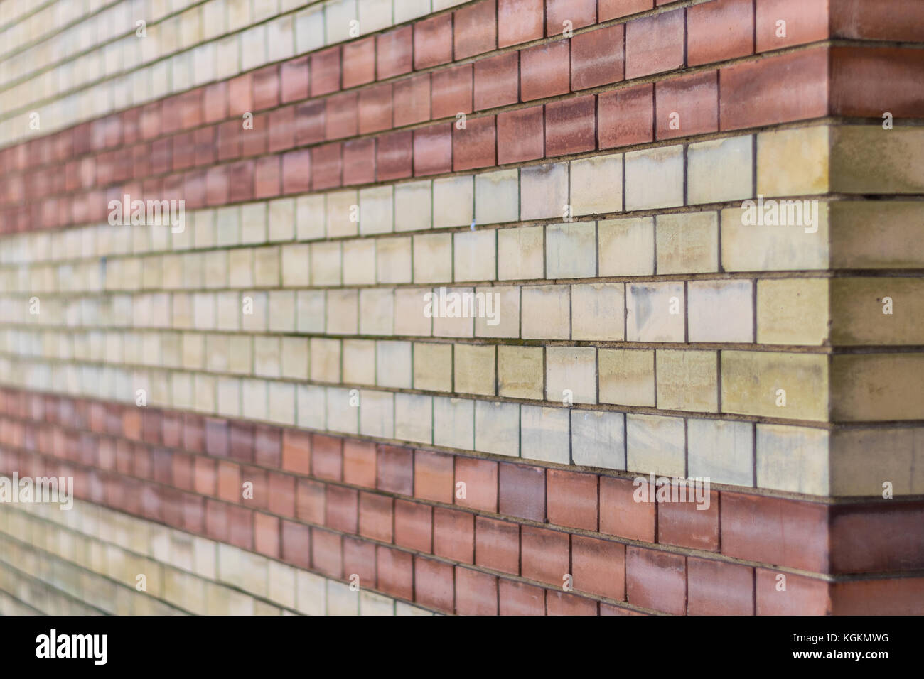 Red and yellow brick wall texture Stock Photo - Alamy