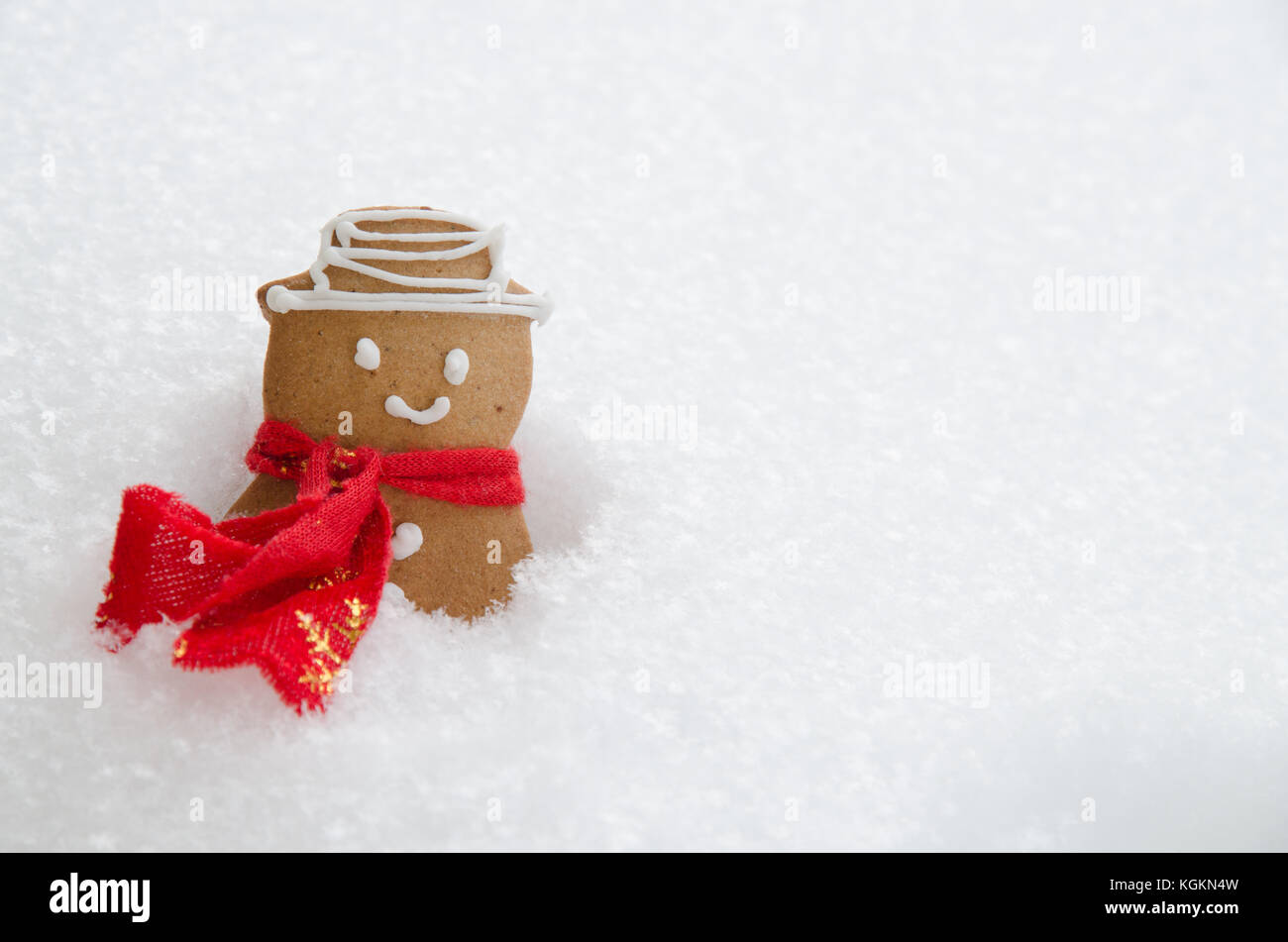 gingerbread sweets in white snow Stock Photo - Alamy