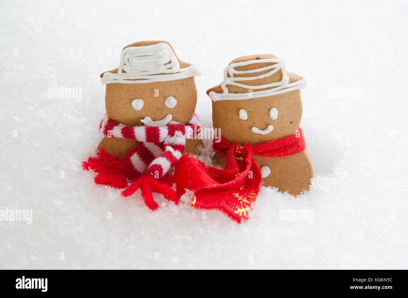gingerbread sweets in white snow Stock Photo - Alamy