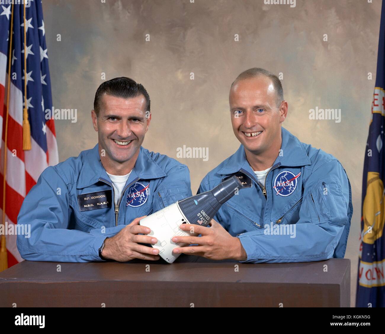 NASA Gemini XI astronauts Dick Gordon, left, and Pete Conrad, hold a ...