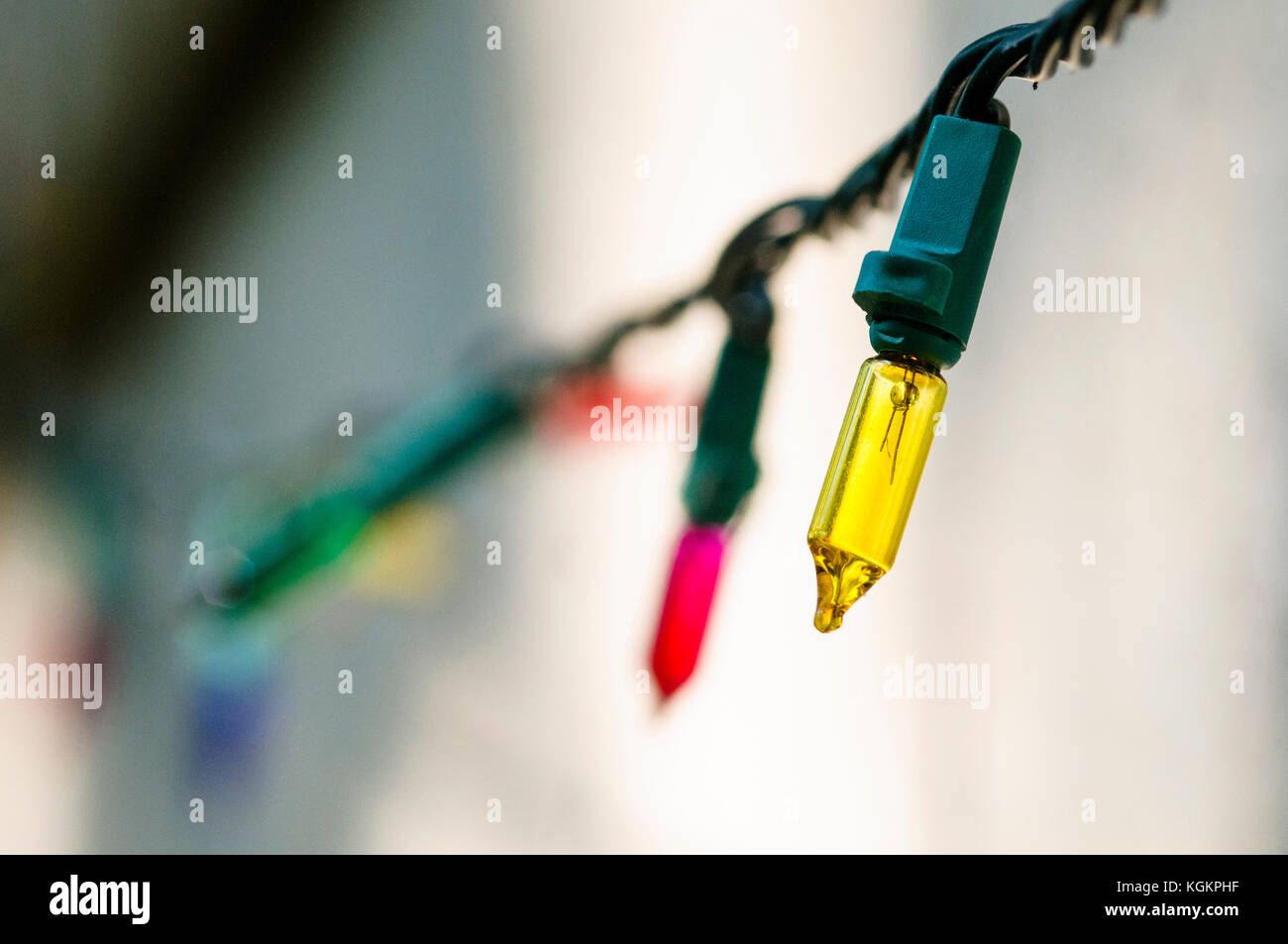 String of colored holiday lights Stock Photo - Alamy
