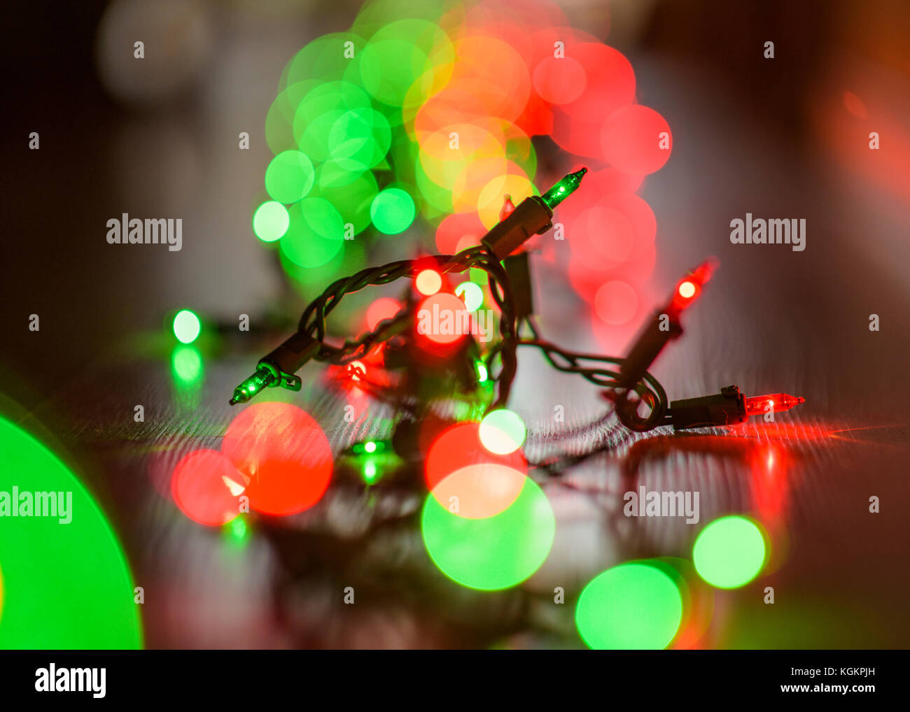 Strand of green and red decorative holiday lights Stock Photo - Alamy