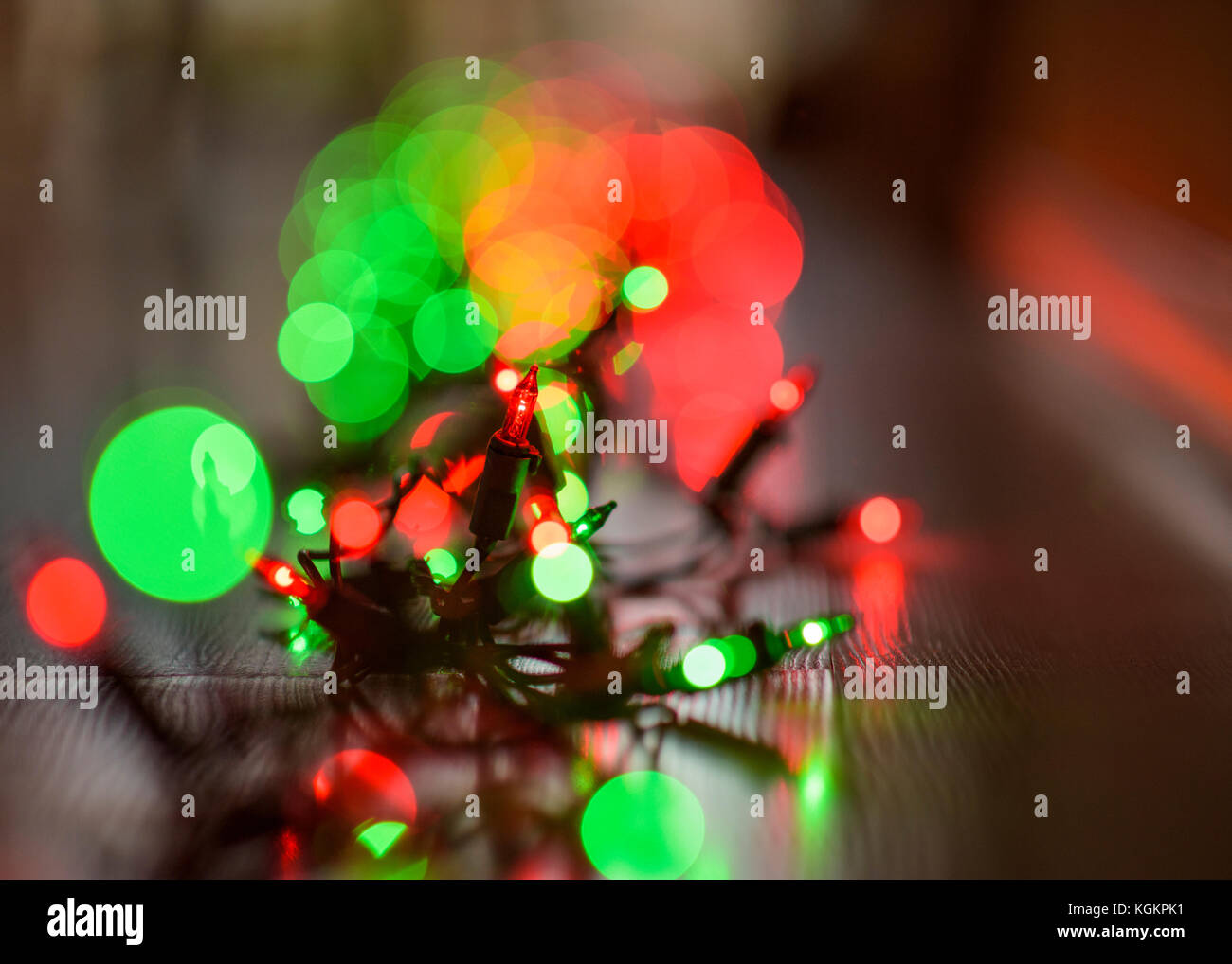 Strand of green and red decorative holiday lights Stock Photo - Alamy