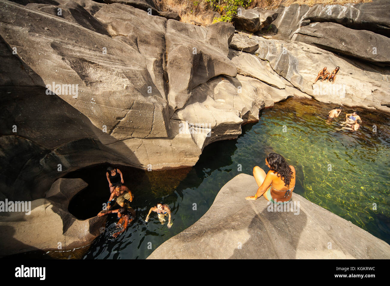 Tourists enjoying a visit to Vale da Lua, Chapada dos Veadeiros, Goiás ...