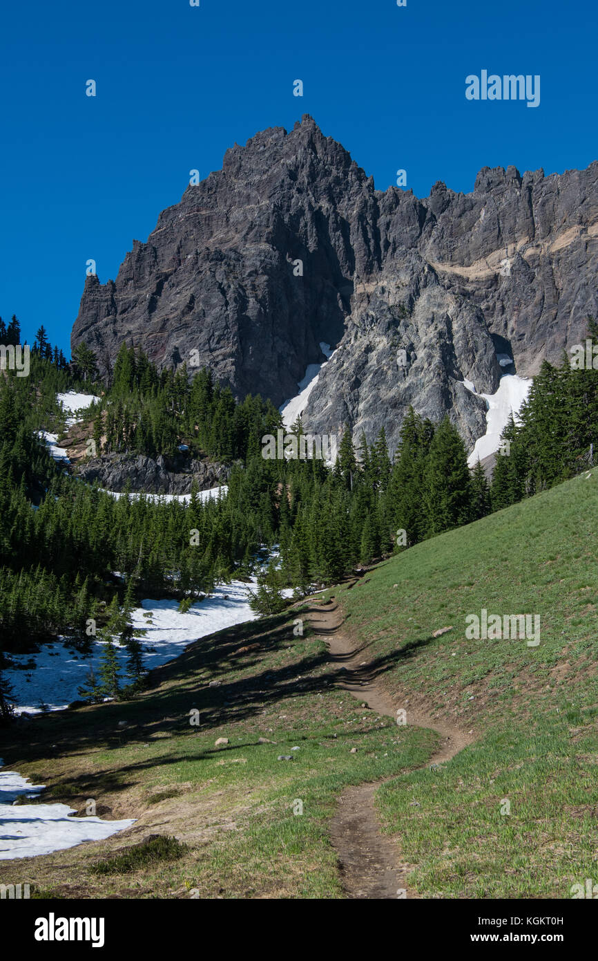 Trail Leads to Three Fingered Jack in central Oregon Stock Photo - Alamy