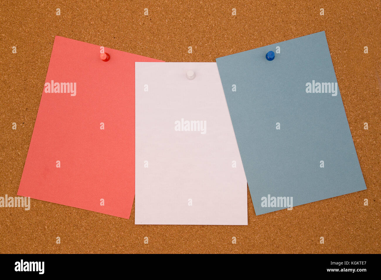 Blank Red, White and Blue Paper on a Cork Board Stock Photo - Alamy