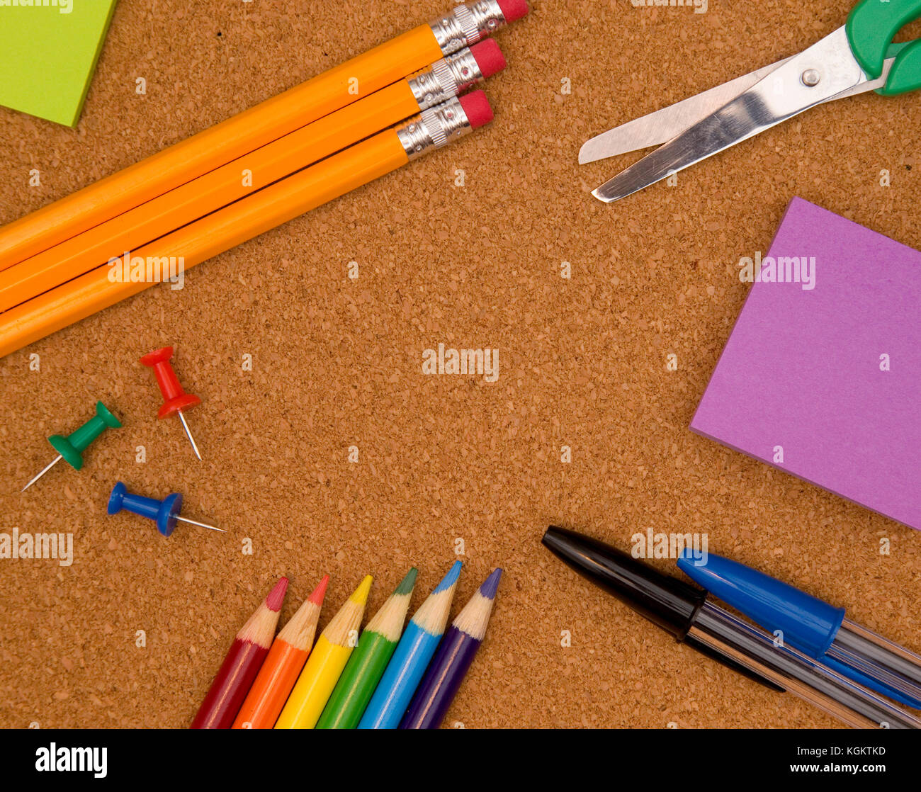A Background of School Supplies on a Cork Board Stock Photo - Alamy