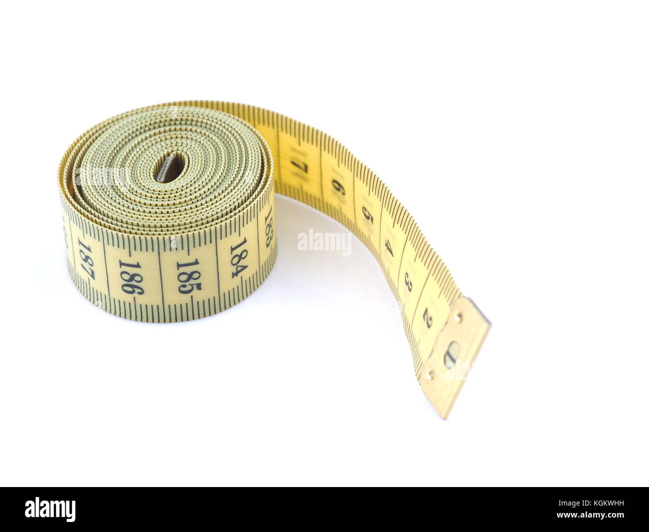 yellow measuring tape on white background Stock Photo - Alamy
