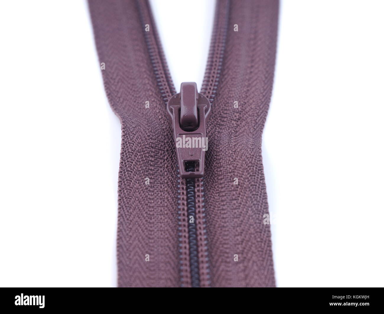 brown zipper on white background Stock Photo - Alamy