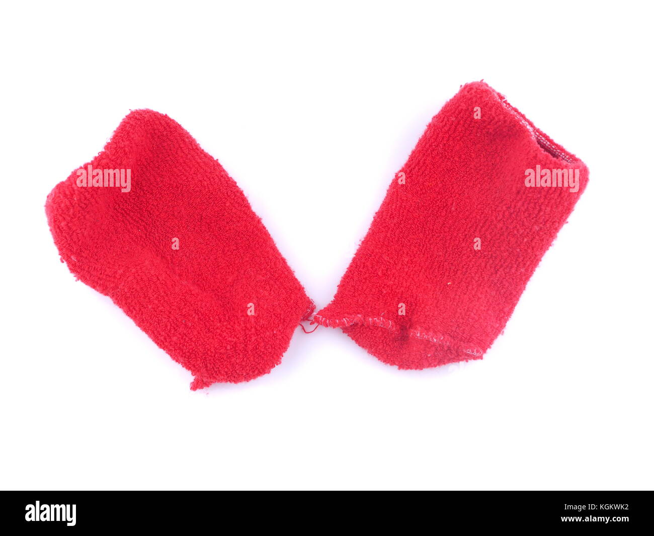 red children's socks on a white background Stock Photo - Alamy