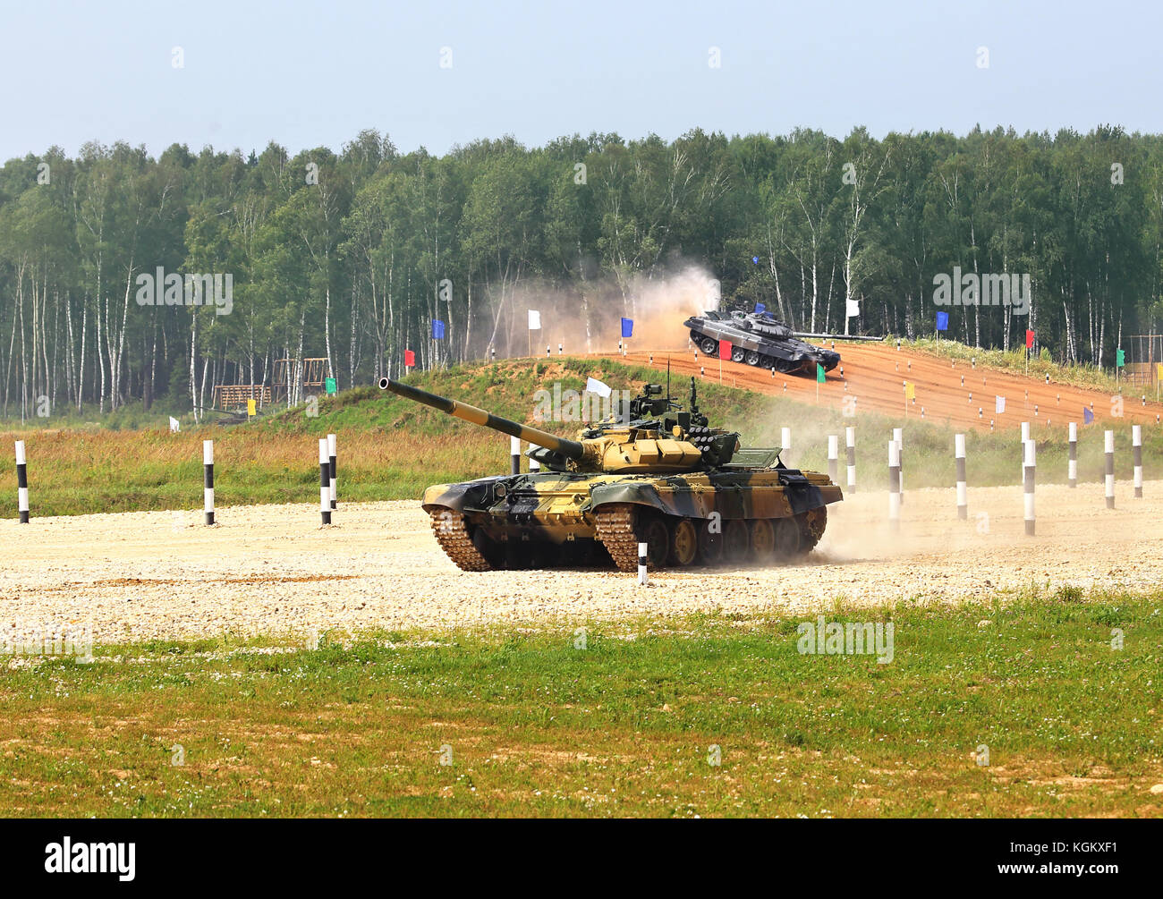 Two main battle tanks on a march over rough terrain Stock Photo - Alamy