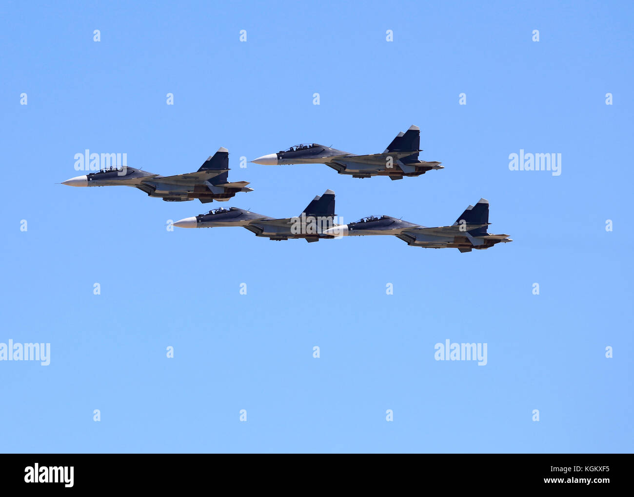 Group of russian fighters flying in a blue sky Stock Photo - Alamy