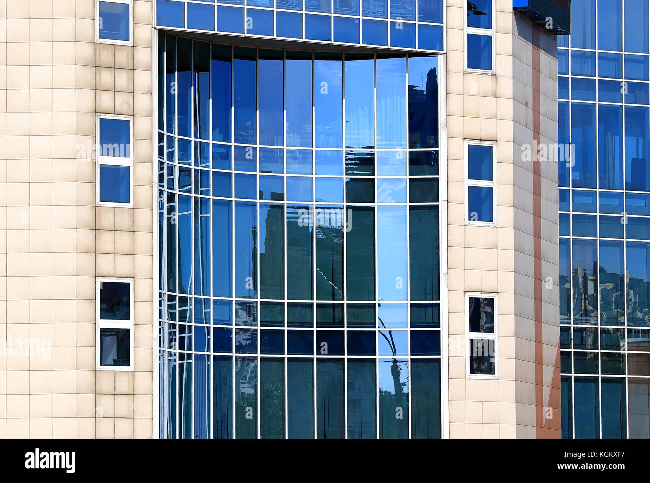 Wall of large high-tech style building with large glass windows Stock ...