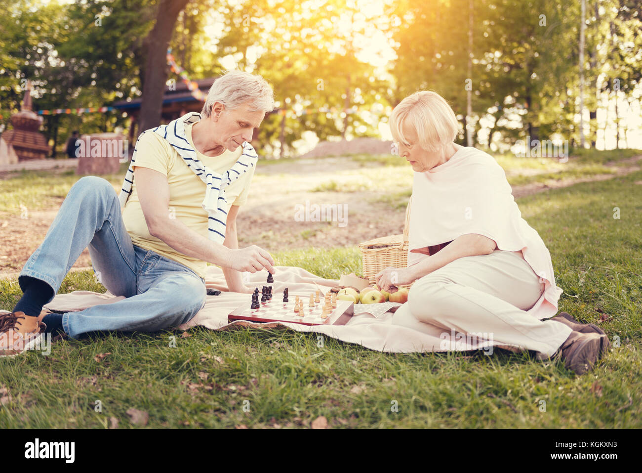 Nice smart people playing chess Stock Photo - Alamy