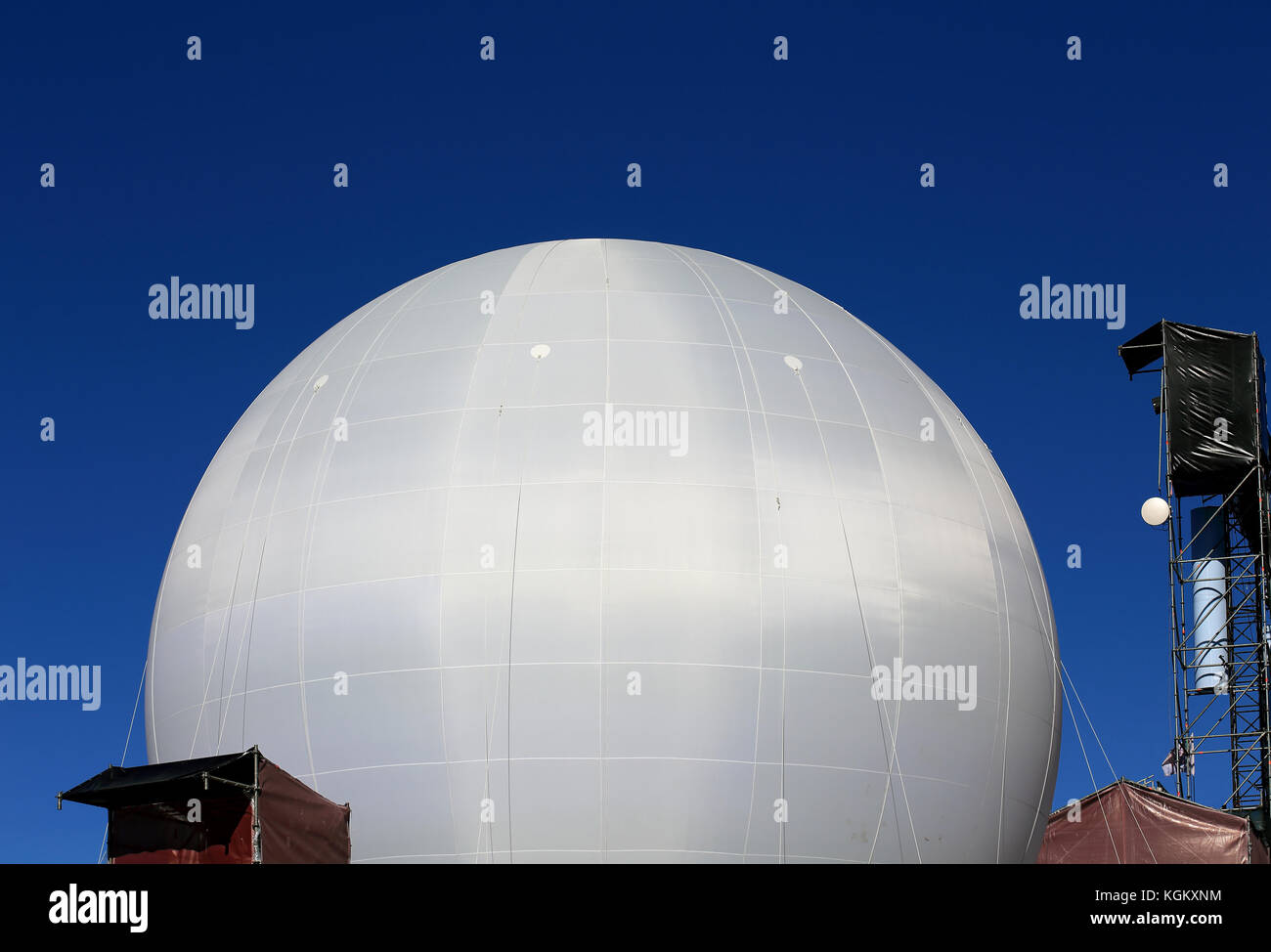 Filling with helium white vinyl ball before advertising design Stock ...