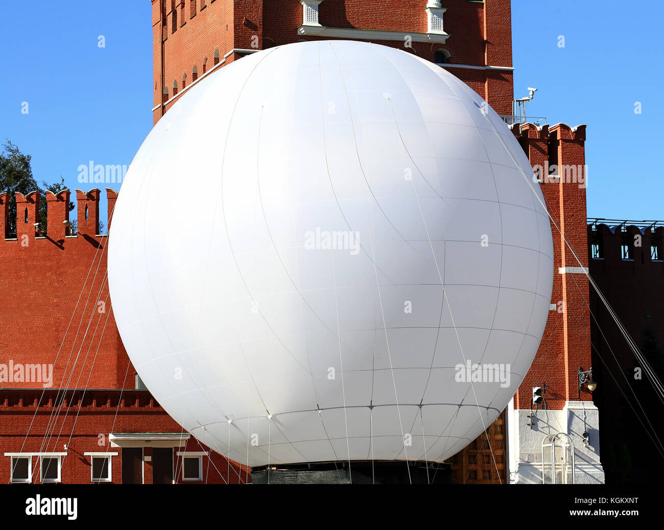 Filling with helium white vinyl ball before advertising design Stock ...
