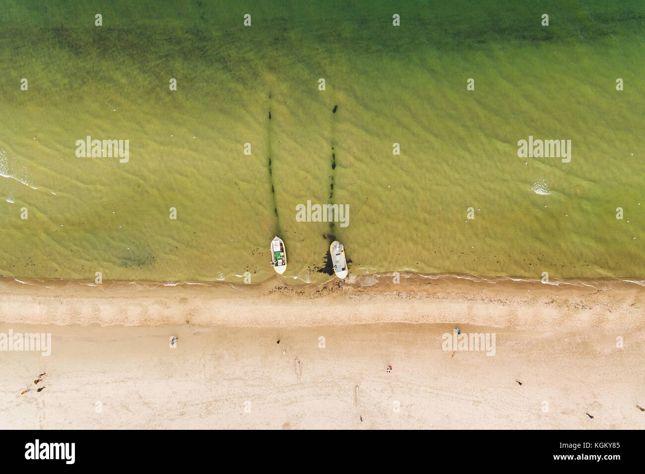 Fishing boats on seashore, top view Stock Photo - Alamy