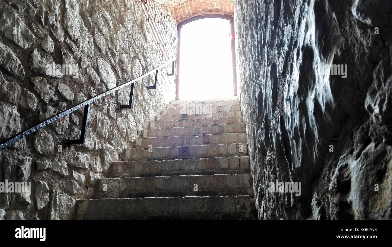 The stairway in some medieval castle showing the way up to a better and ...