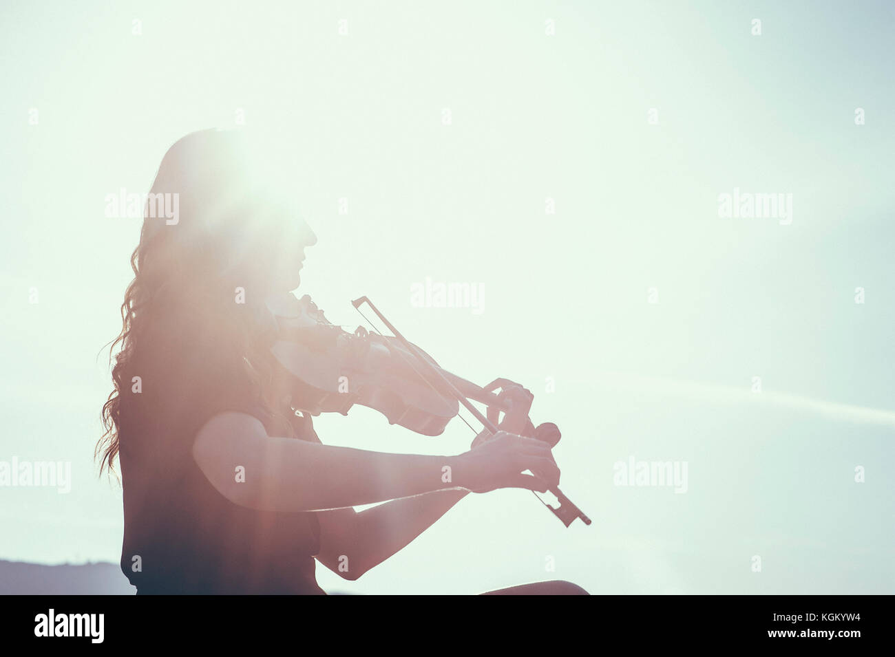 Woman back view profile sitting hi-res stock photography and images - Alamy