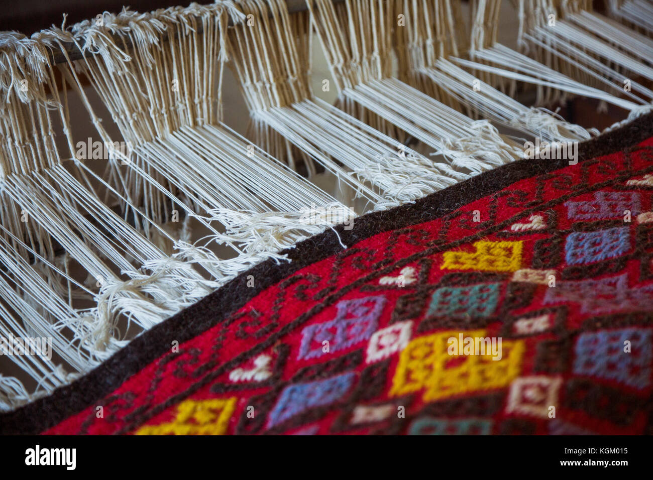High angle view of fabric handloom weaving machine Stock Photo - Alamy