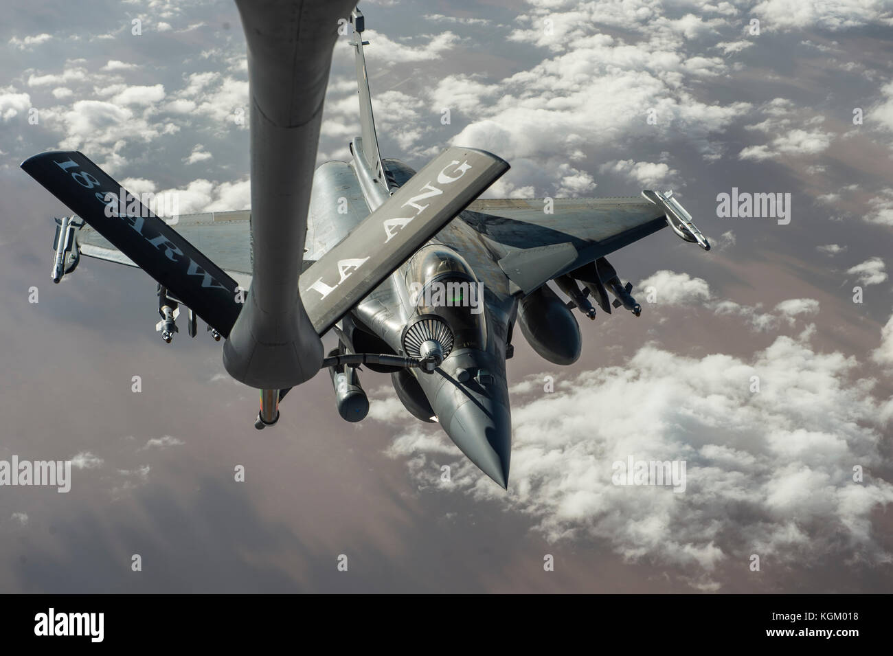 A French Air Force Rafale conducts refueling operations with a KC-135 ...