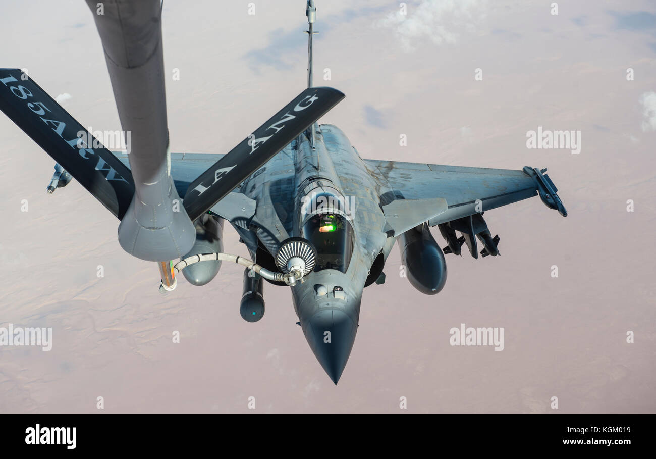 A French Air Force Rafale conducts refueling operations with a KC-135 ...