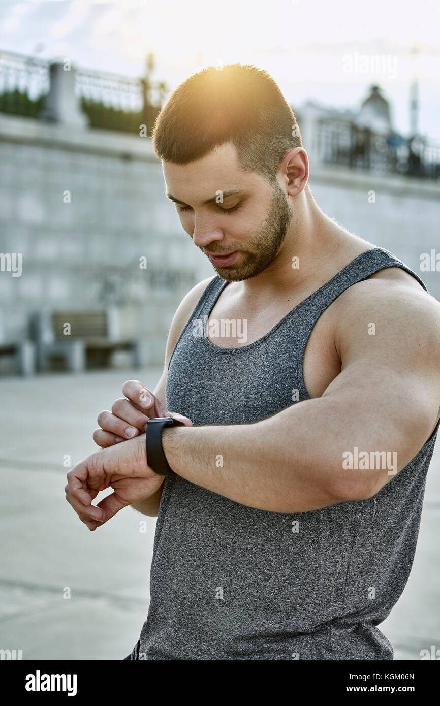 Using smart watch sunset hi-res stock photography and images - Alamy