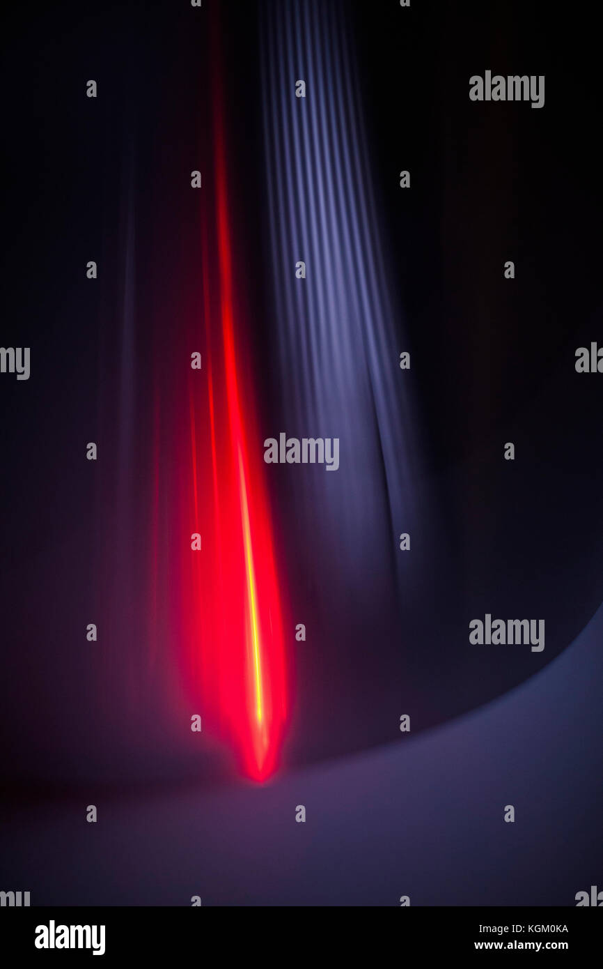 Abstract red and gray light trails against black background Stock Photo ...