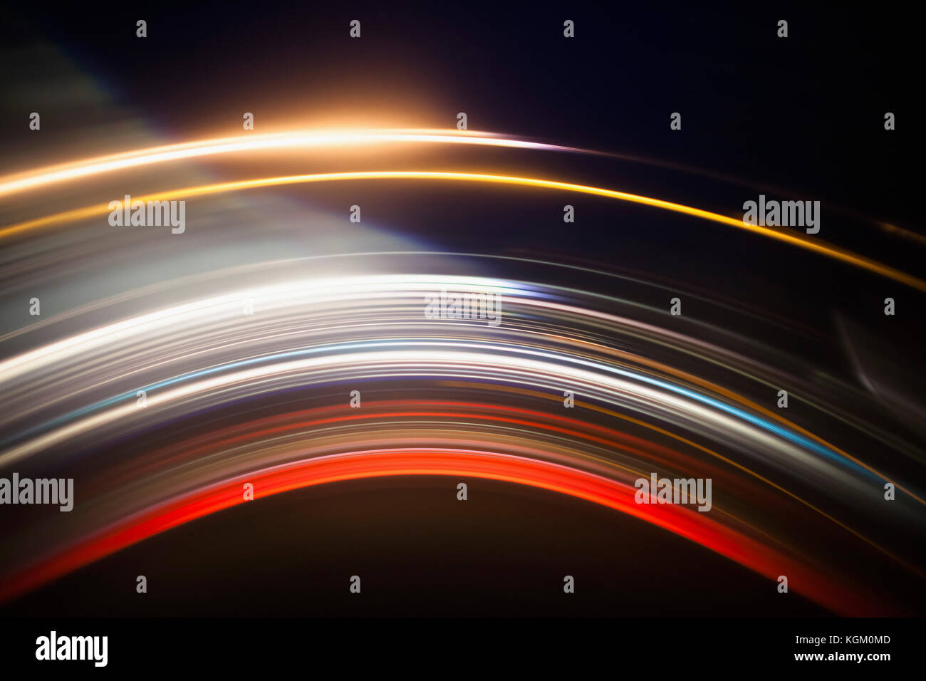 Various abstract light trails against black background Stock Photo - Alamy