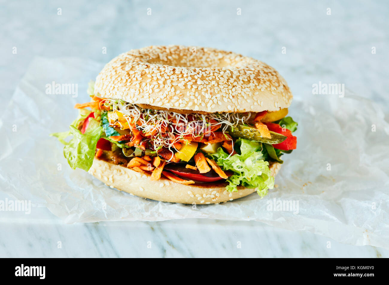 Close-up of fresh vegetarian burger on table Stock Photo - Alamy