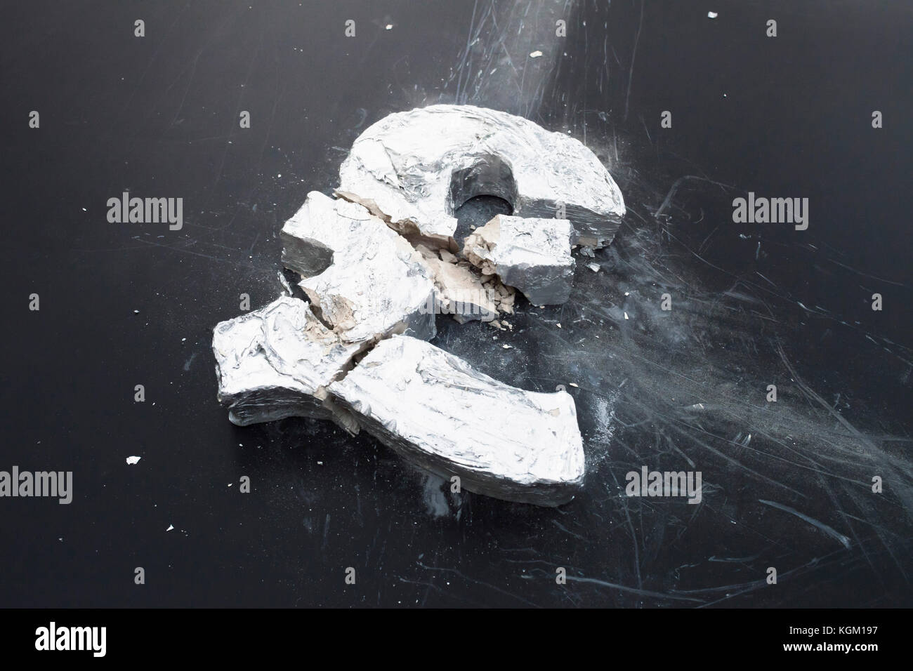High angle view of broken concrete Pound symbol on table Stock Photo ...