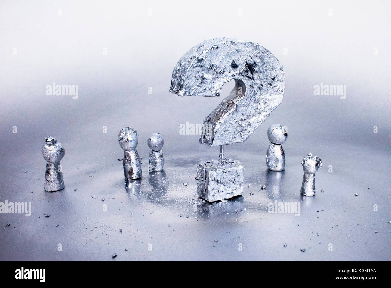 Close-up of silver question mark against gray background Stock Photo ...