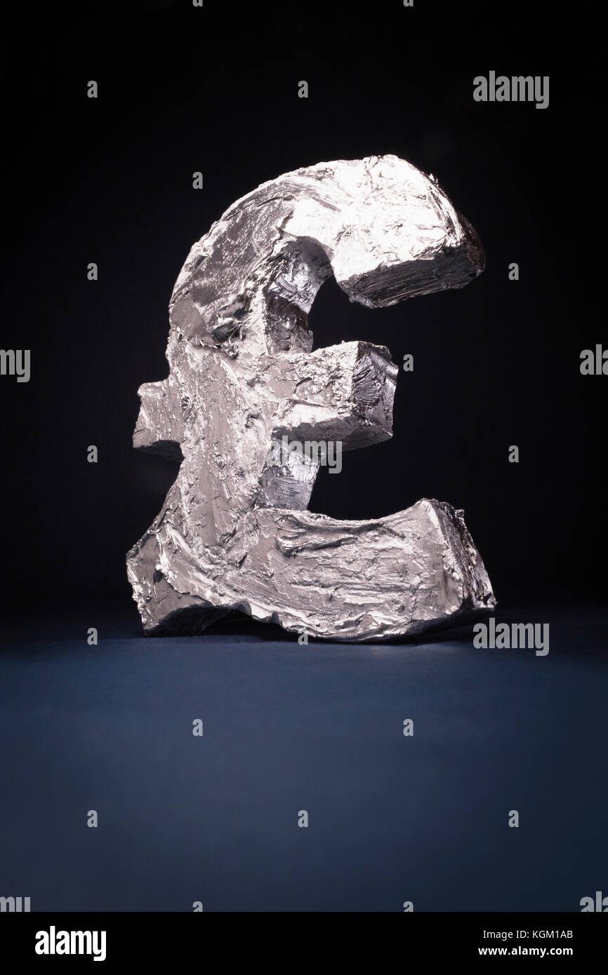 Close-up of pound symbol against black background Stock Photo - Alamy