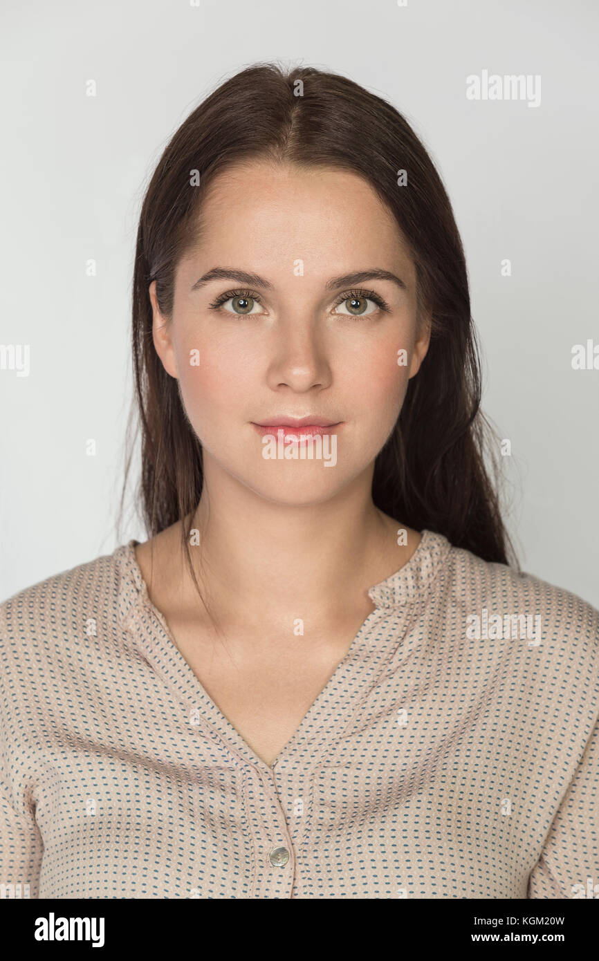 Portrait of beautiful mid adult woman against white background Stock ...