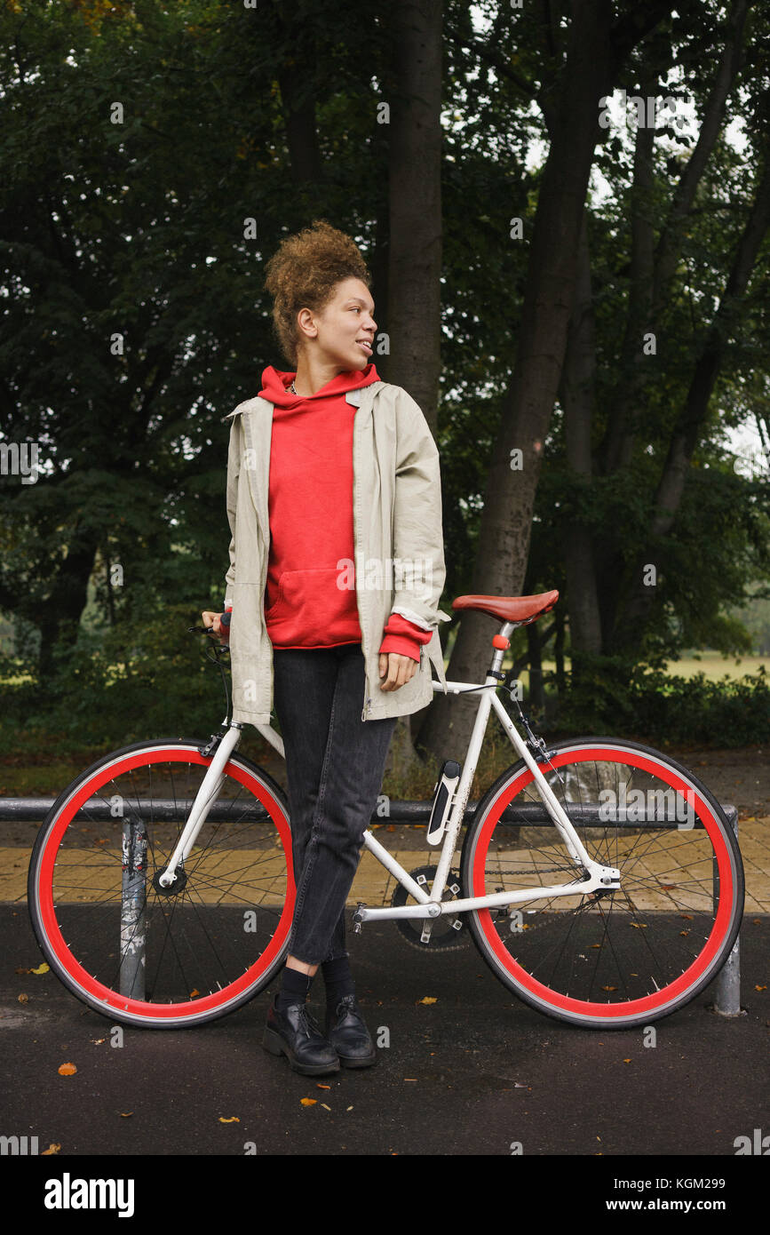 Mixed race woman bicycle hi-res stock photography and images - Alamy