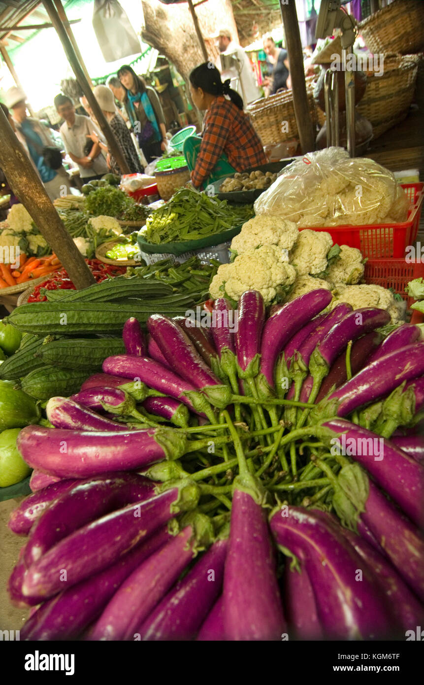 Women selling their fresh produce at the local market in Bagan daily ...