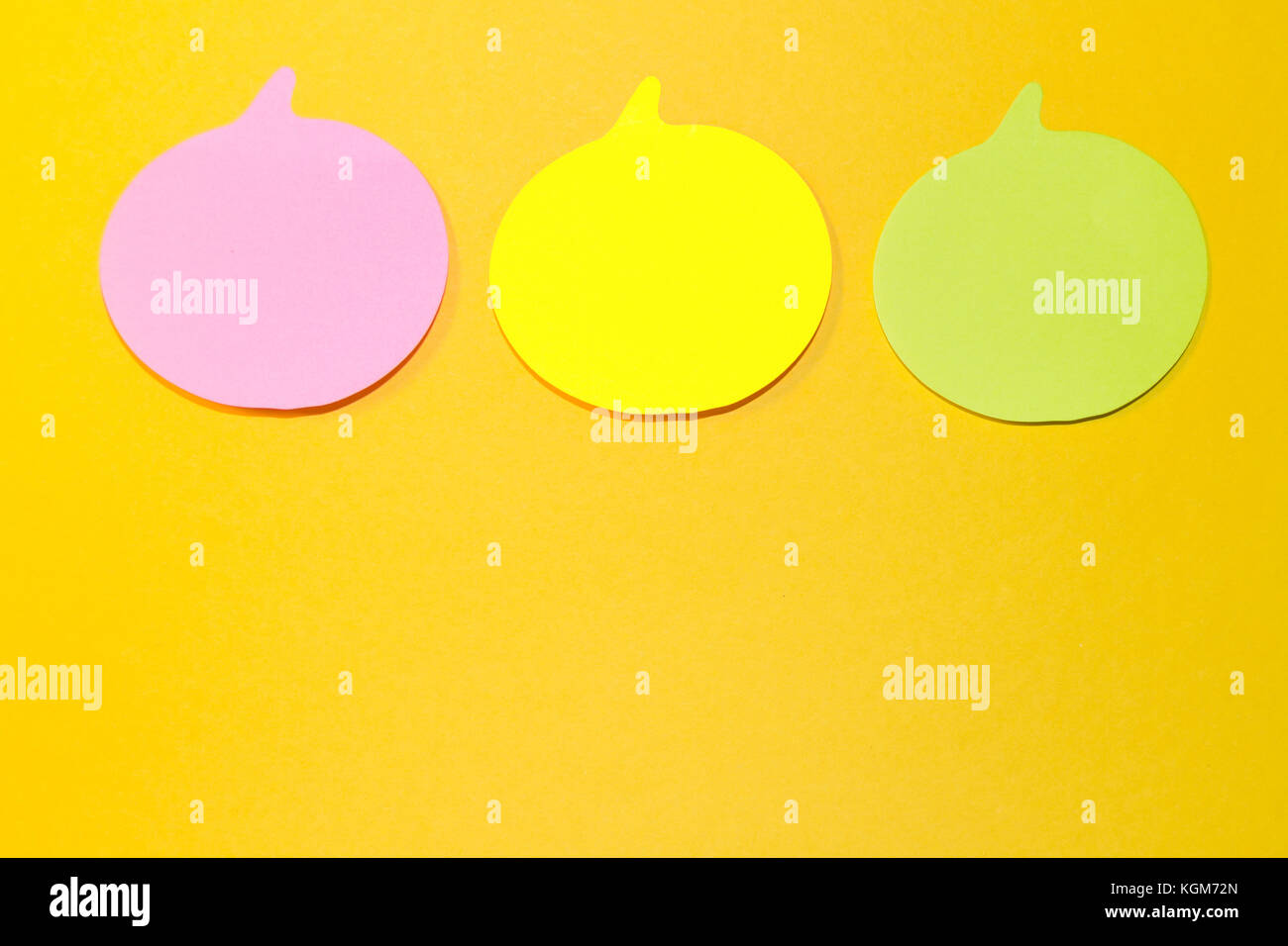 Round Sticky notes on Orange wall, isolated Stock Photo - Alamy