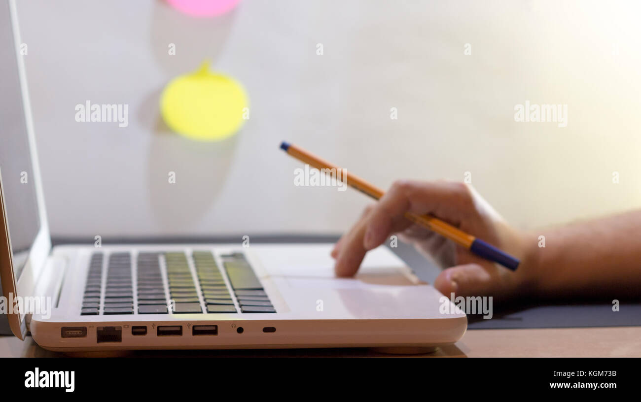 Using a Computer laptop office working Stock Photo - Alamy